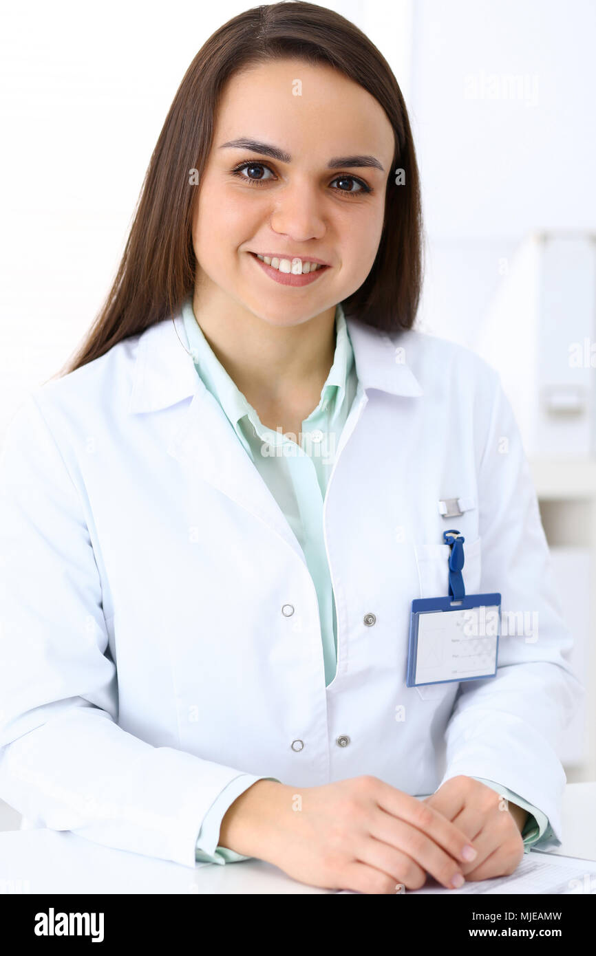 Woman doctor at work in hospital office. Medicine and health care ...