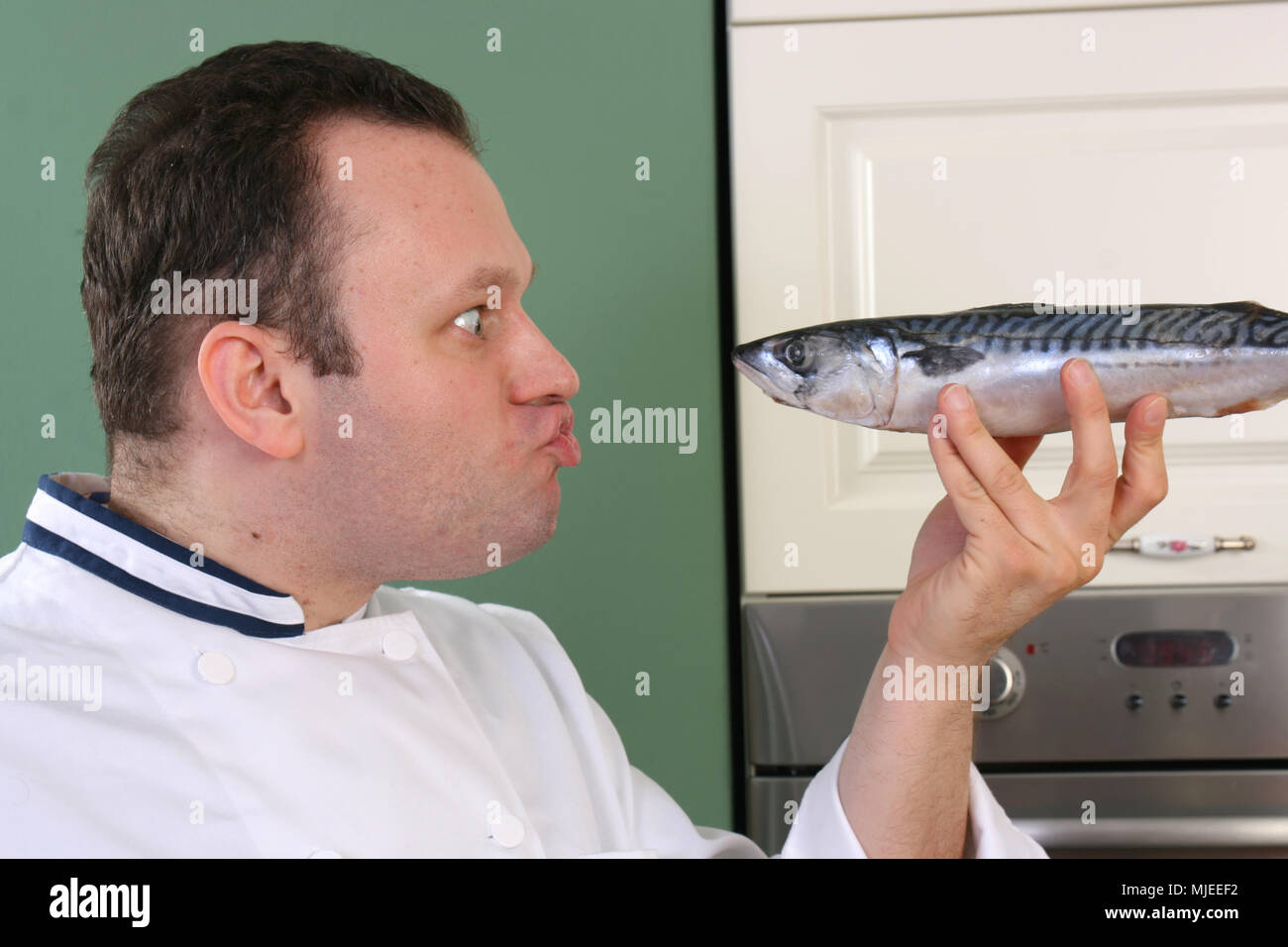 Man kissing his fish hi-res stock photography and images - Alamy