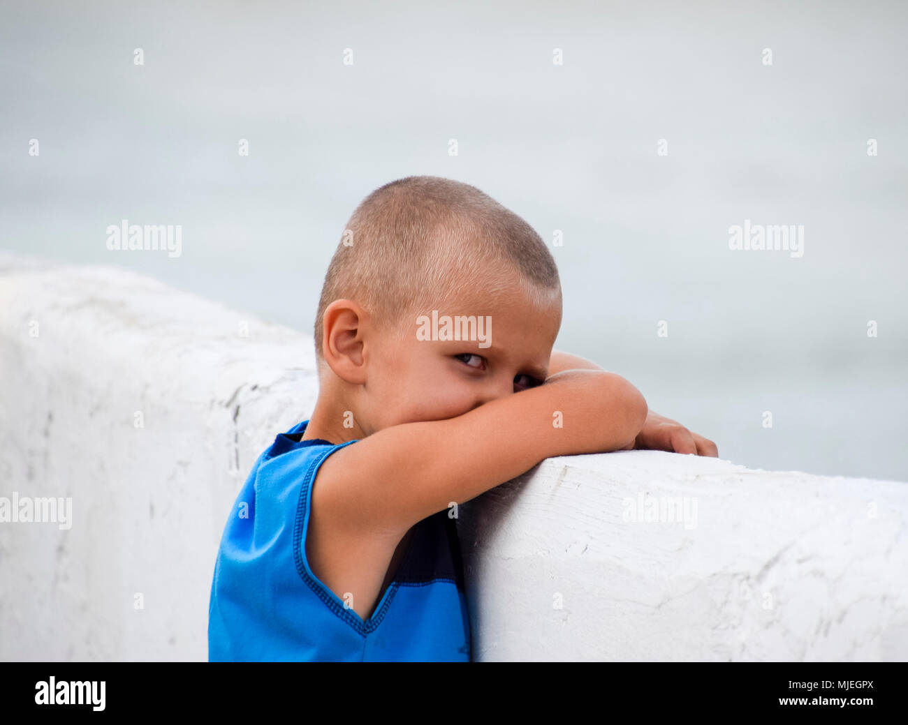 The child was offended. Anger and resentment of a little boy. The baby ...