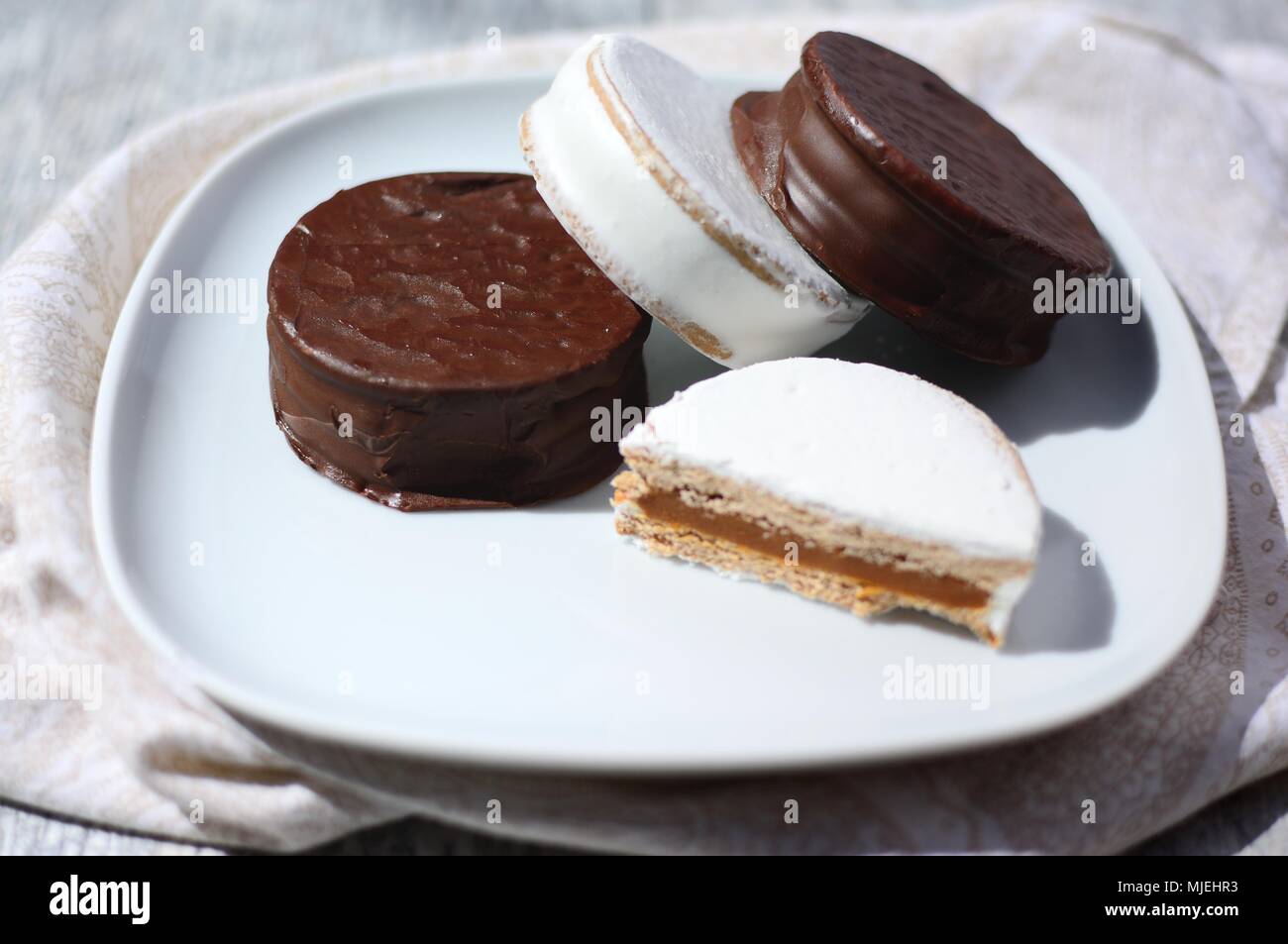 White and Dark Chocolate Alfajors Stock Photo - Alamy