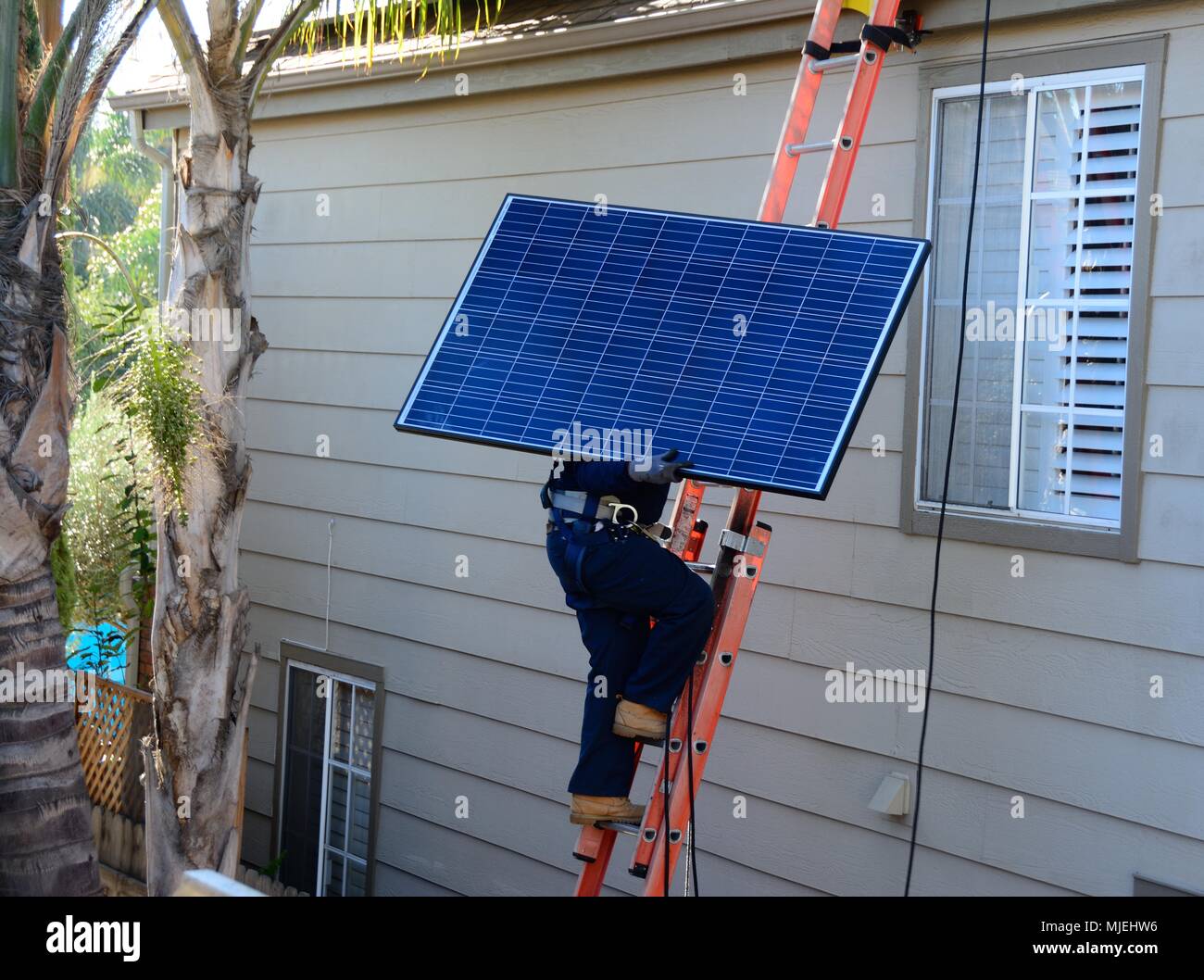Installing solar panel hi-res stock photography and images - Alamy