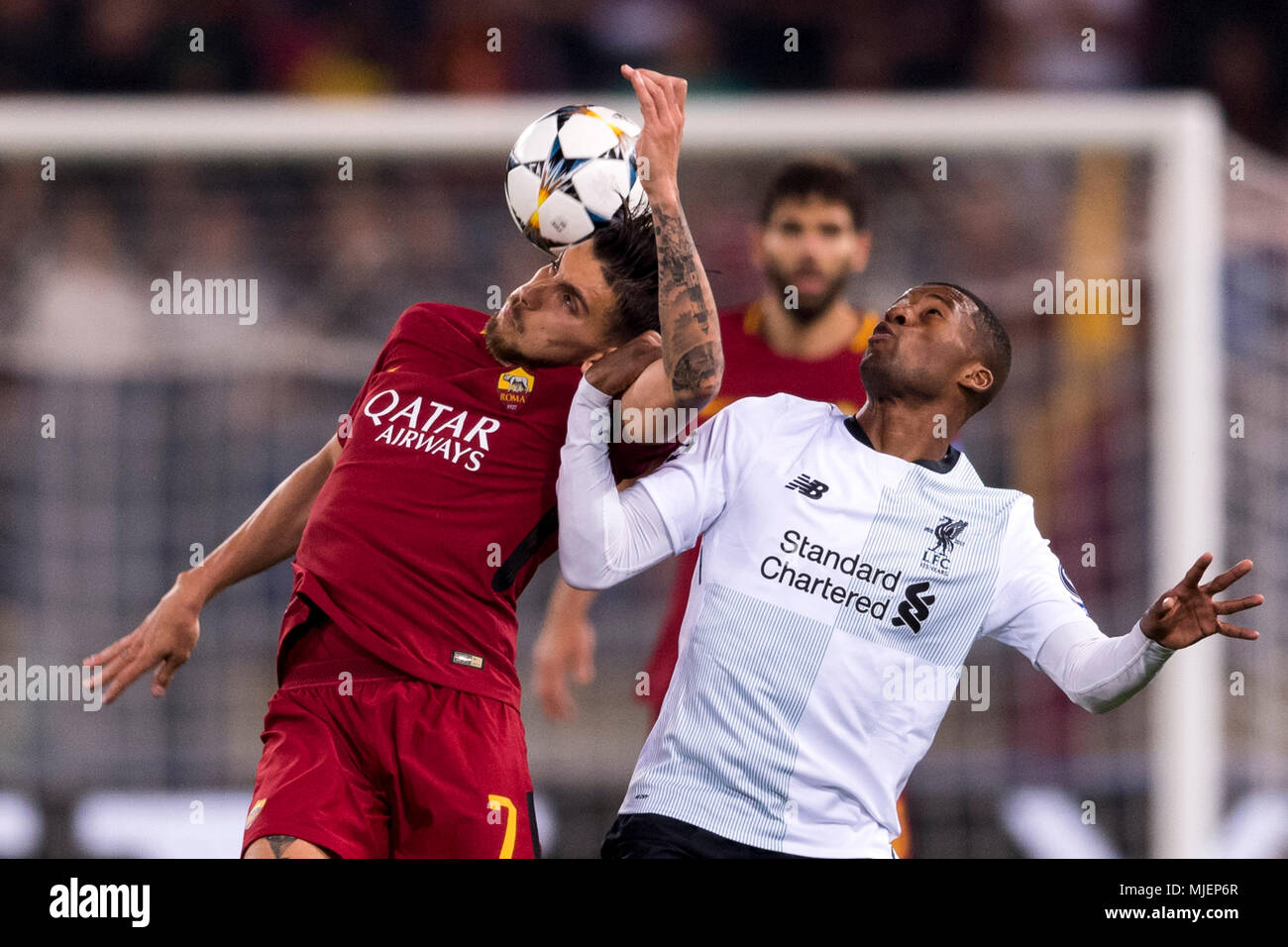 Lorenzo Pellegrini of Roma and Georginio Wijnaldum of Liverpool FC ...
