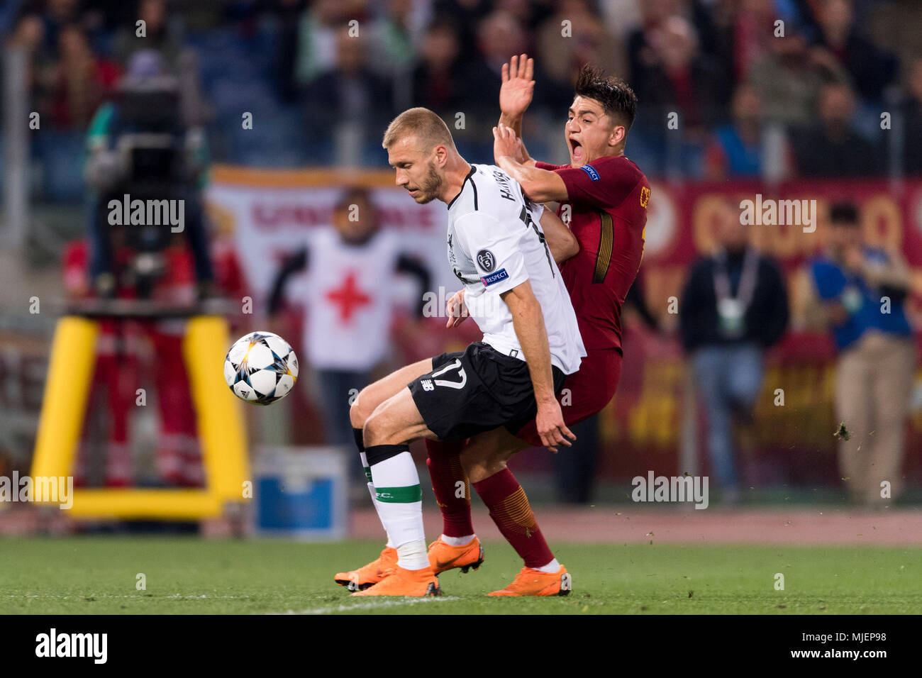 Ragnar Klavan of Liverpool FC and Cengiz Under of Roma during the Uefa ...
