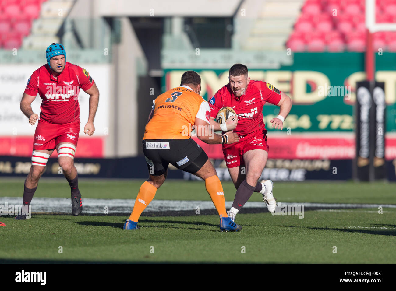 Scarlets loose head prop Rob Evans attacks the Cheetahs' defence Stock ...