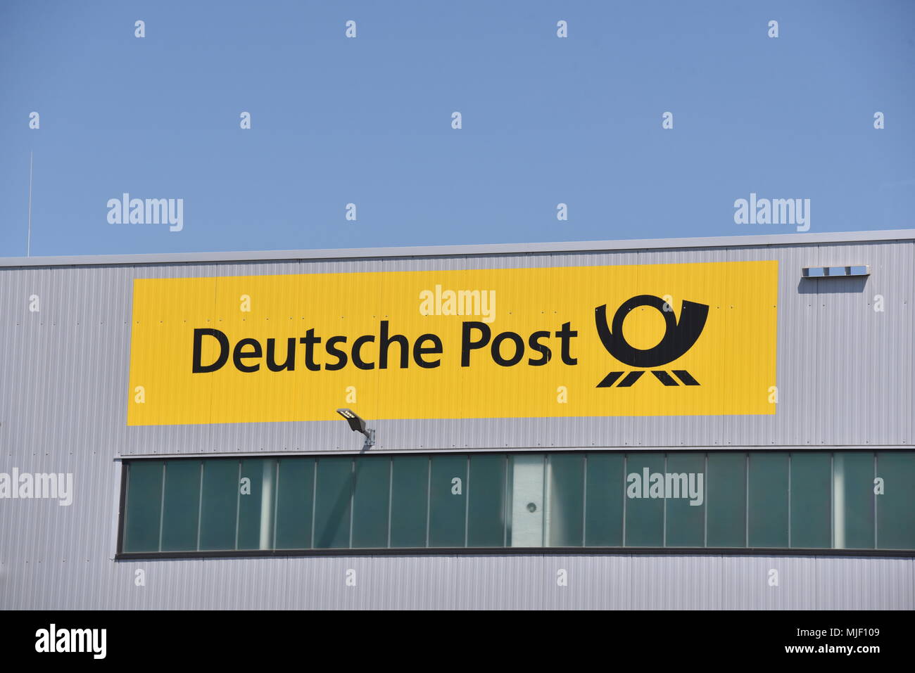 04 May 2018, Germany, Cologne: The logo of German postal service ...