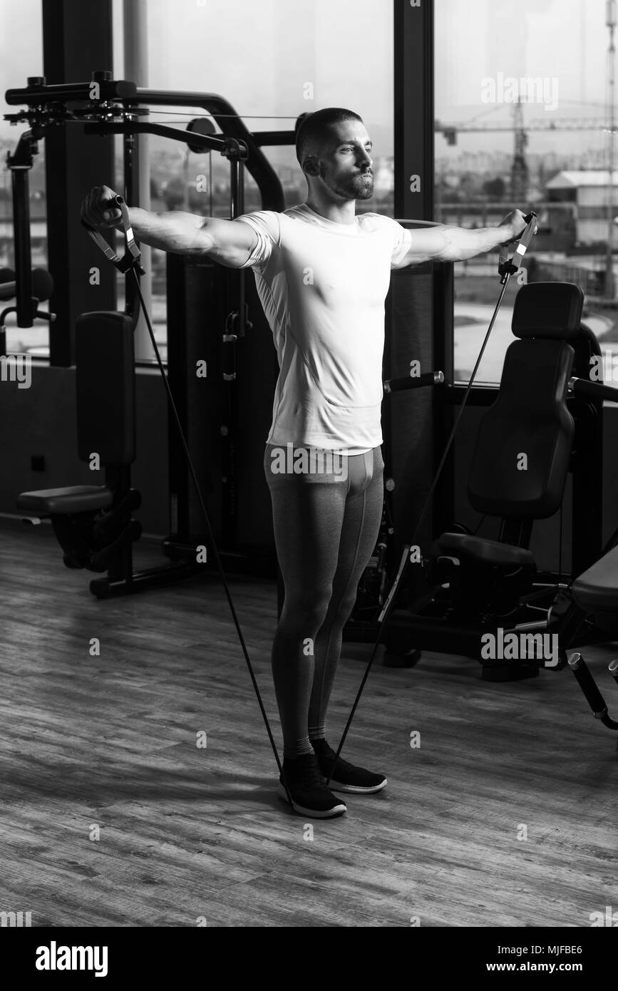 Man pull elastic Black and White Stock Photos & Images - Alamy