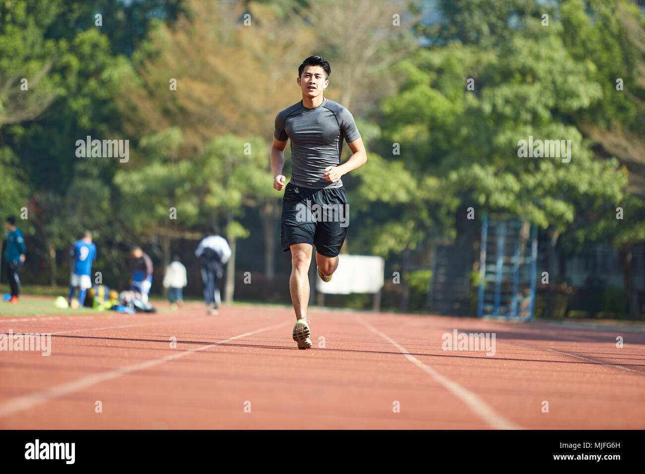 Man in suit running hi-res stock photography and images - Alamy