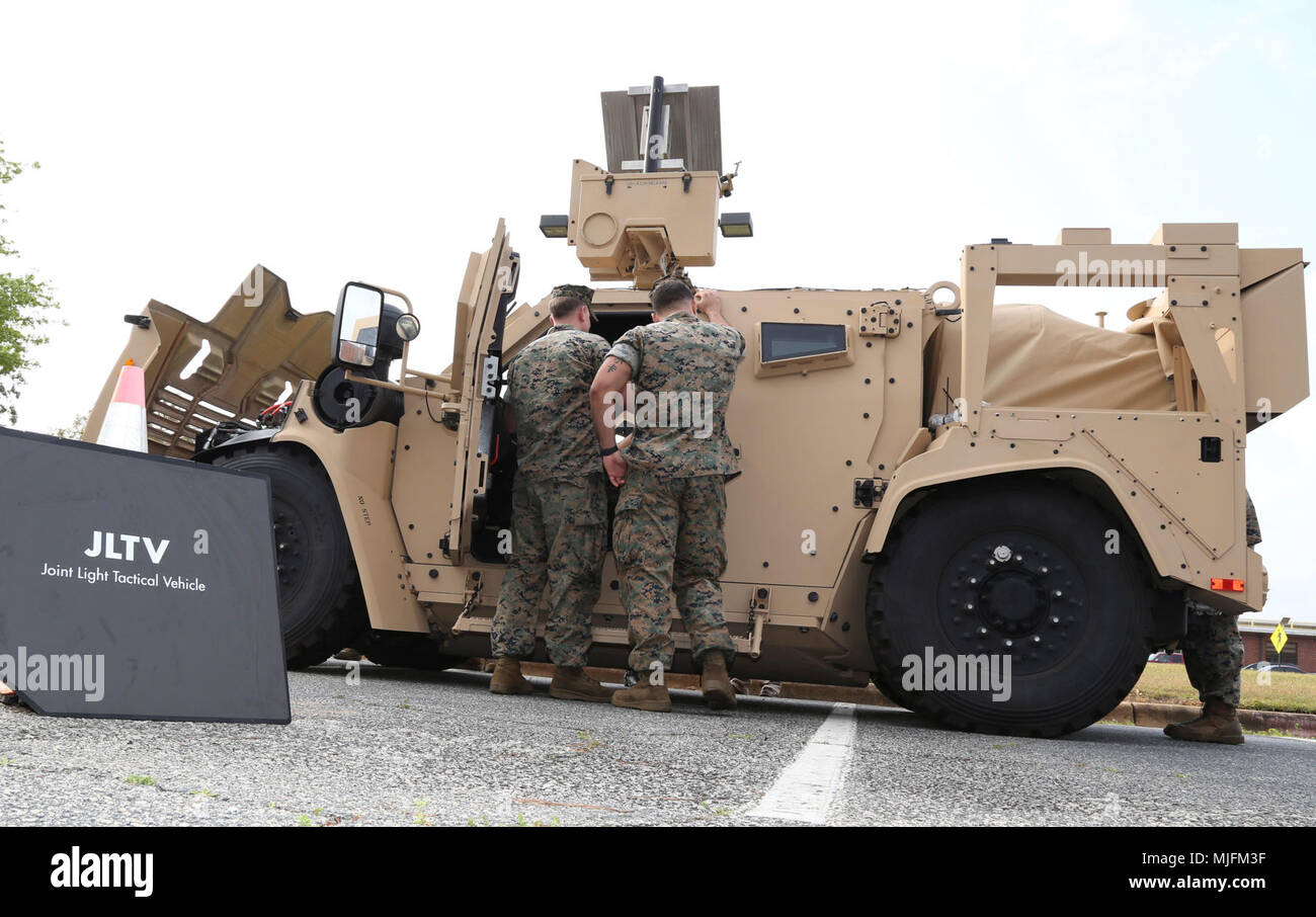 Marine Corps Logistics Command Marines look over the new Joint Light ...