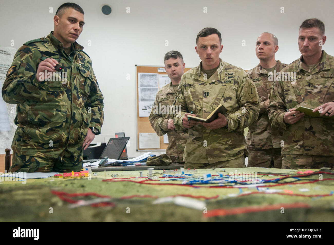 Bulgarian Lt. Col. Ivaylo Ivanov (left), battalion commander of the ...