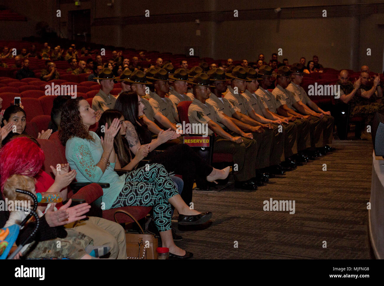 Attendees view a Drill Instructor School graduation ceremony at Marine ...