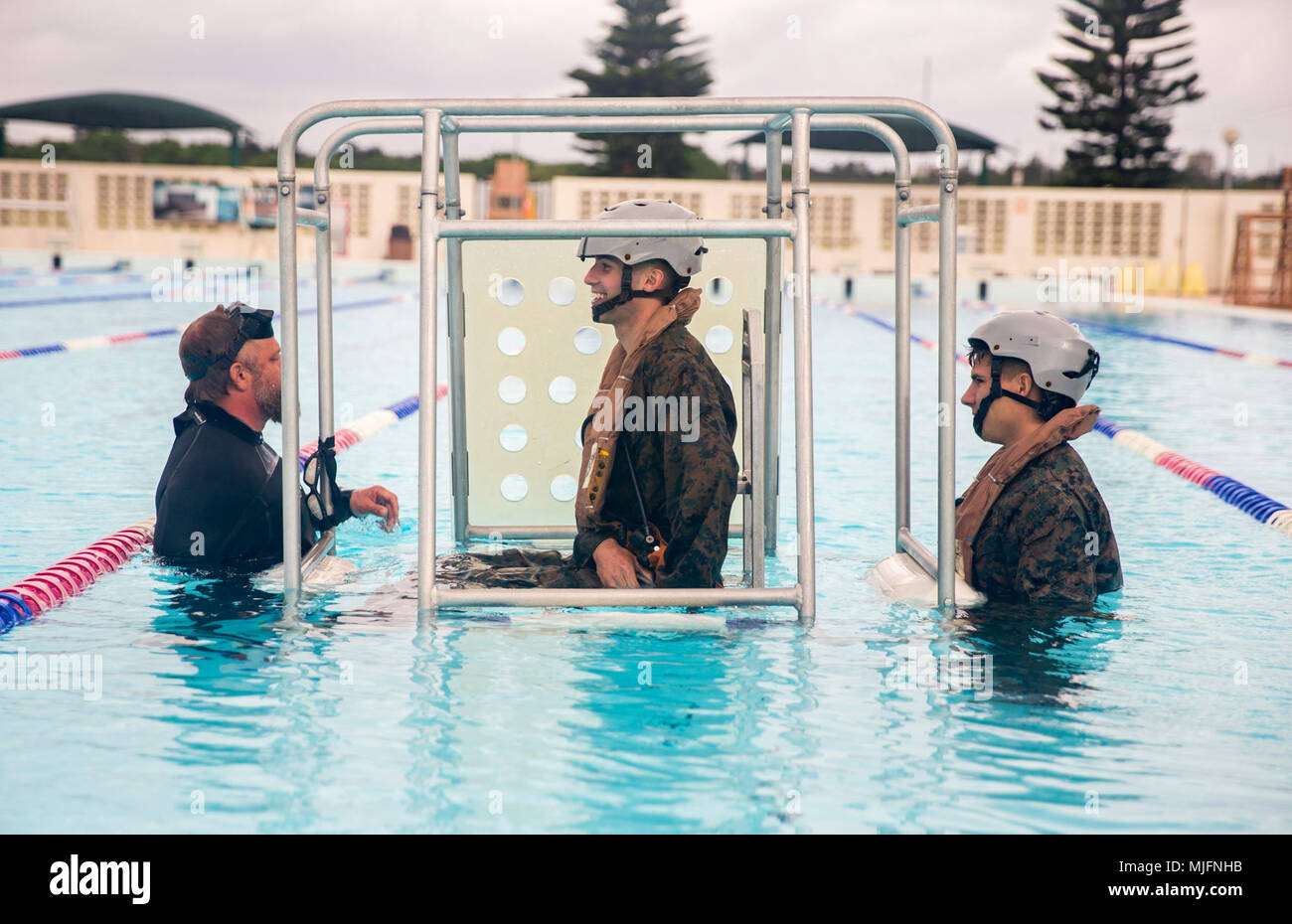 U.S. Marine Cpl. Jordan Mazzaro with sits in the shallow water egress ...
