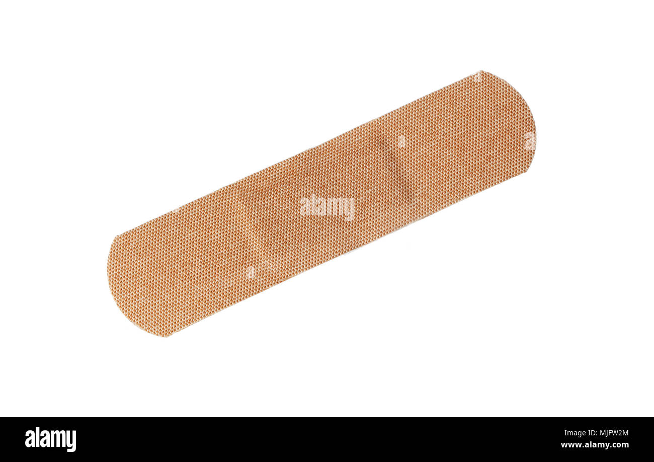 One brown unused fabric plaster isolated on white background Stock ...