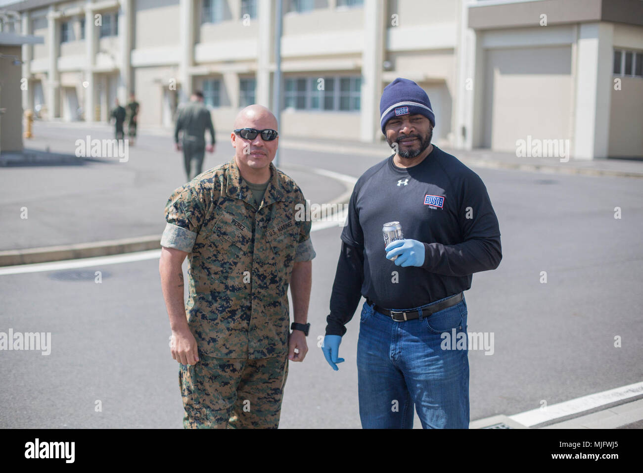 U.S. Marine Corps Sgt. Maj. Laureano Perez, left, sergeant major of ...