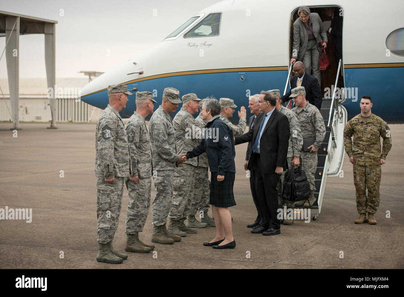 Col Robert I. Kinney shakes hands with Secretary of the Air Force ...