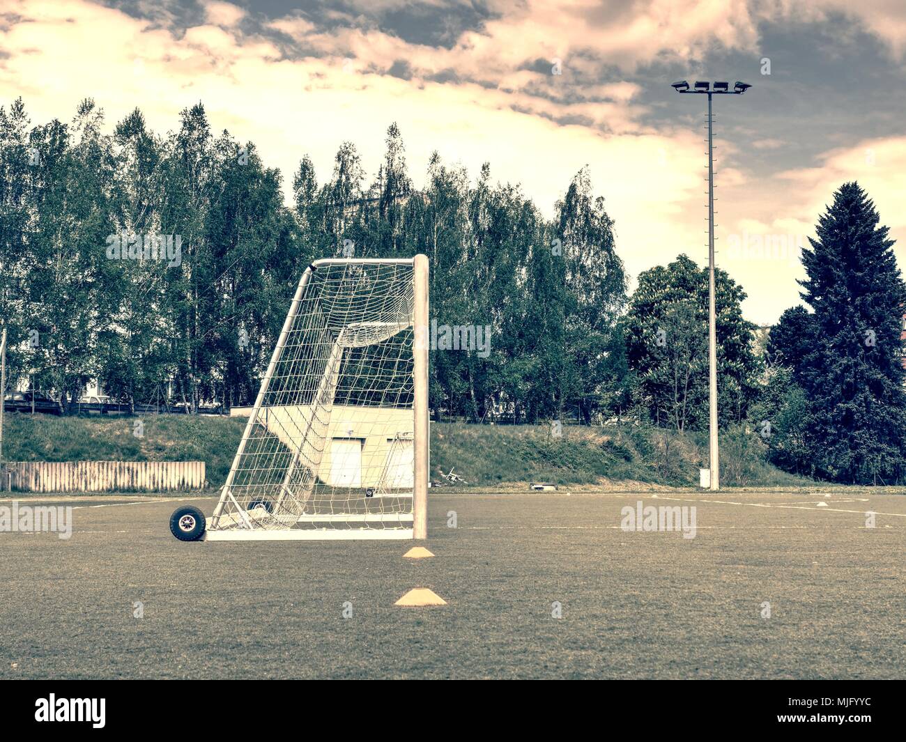 Football playground. Gate with blue yellow nets, soccer football net ...
