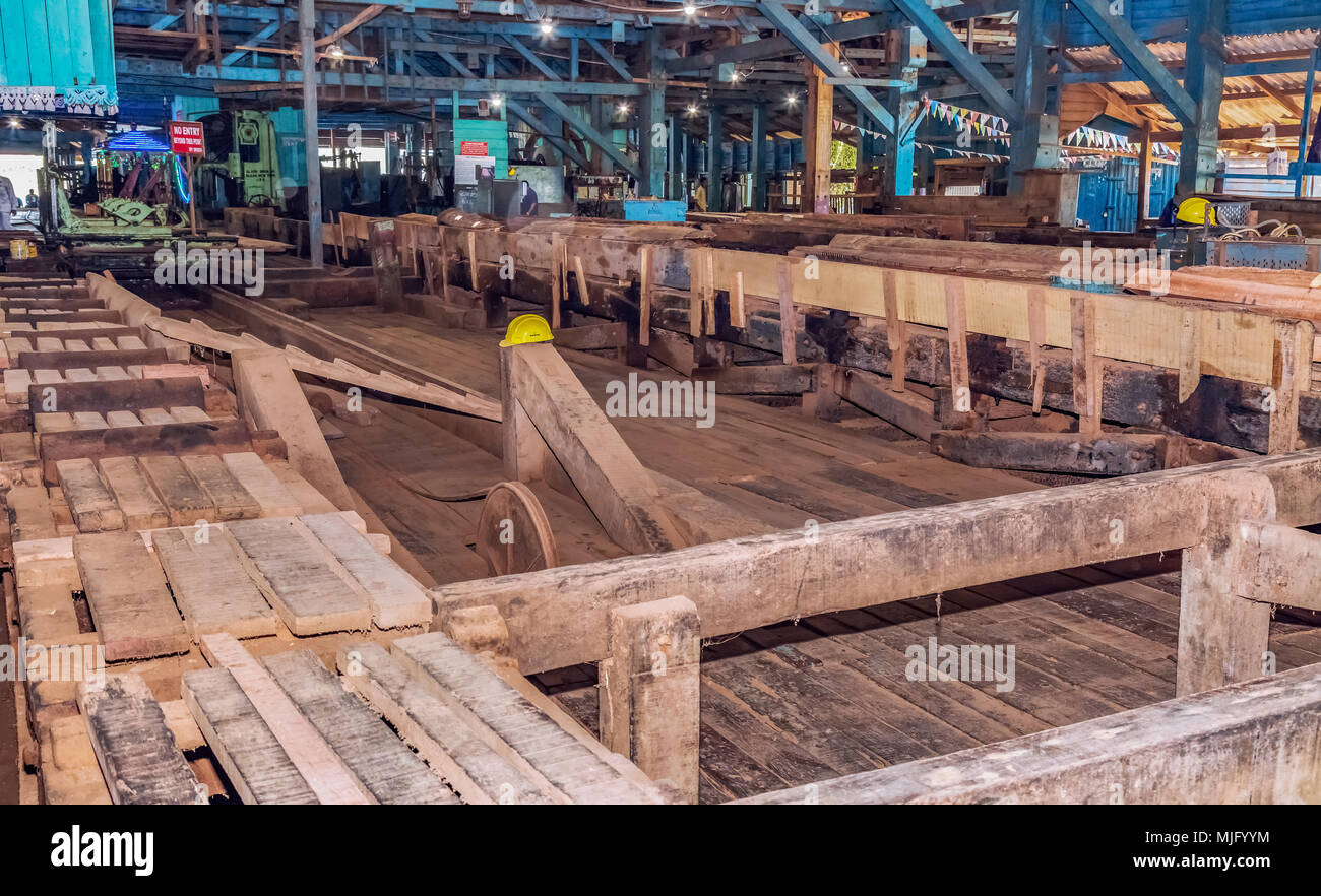 View of the Chatham saw mill factory with machinery and wooden conveyor ...