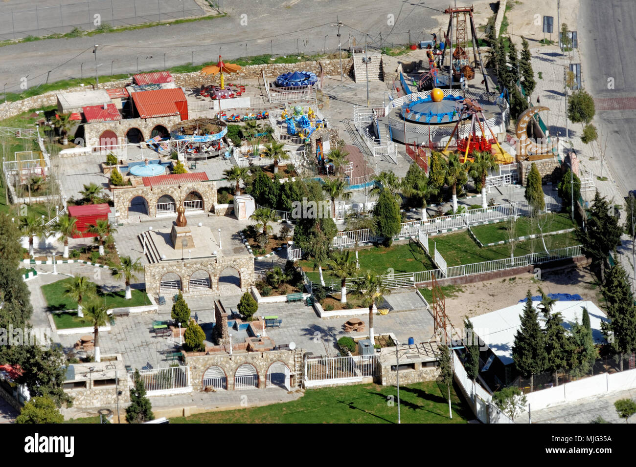 View from above of a small amusement park with play equipment for ...
