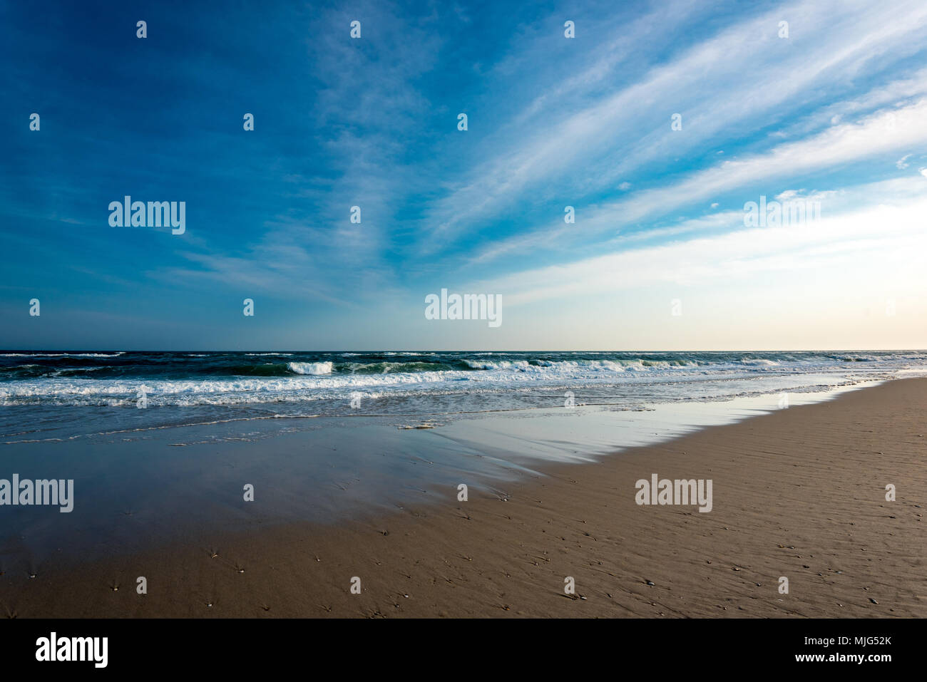 Ocean waves at a deserted beach Stock Photo - Alamy