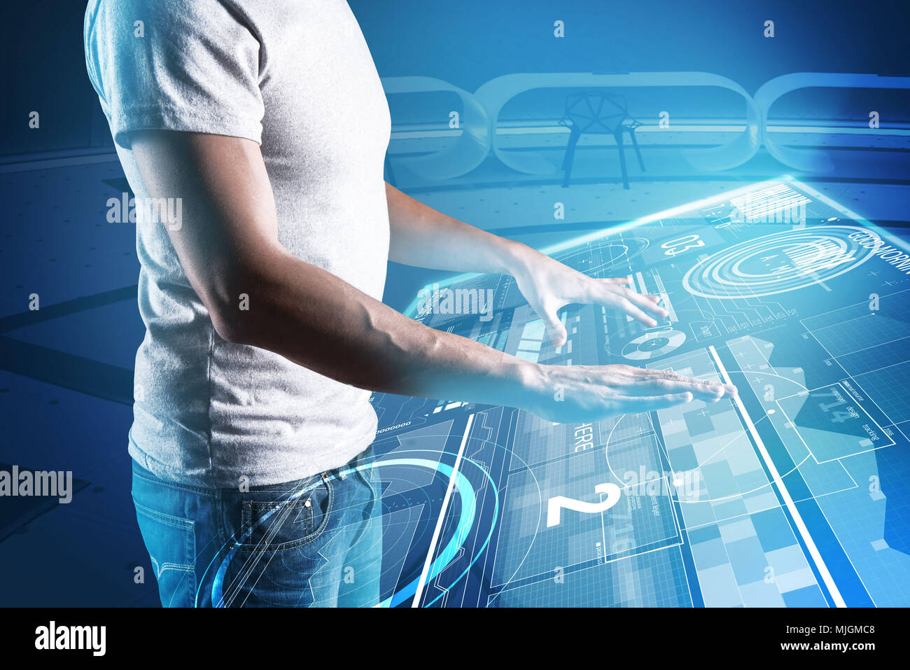 Experienced programmer touching the transparent screen Stock Photo - Alamy Experienced programmer touching the transparent screen Stock Photo - Alamy