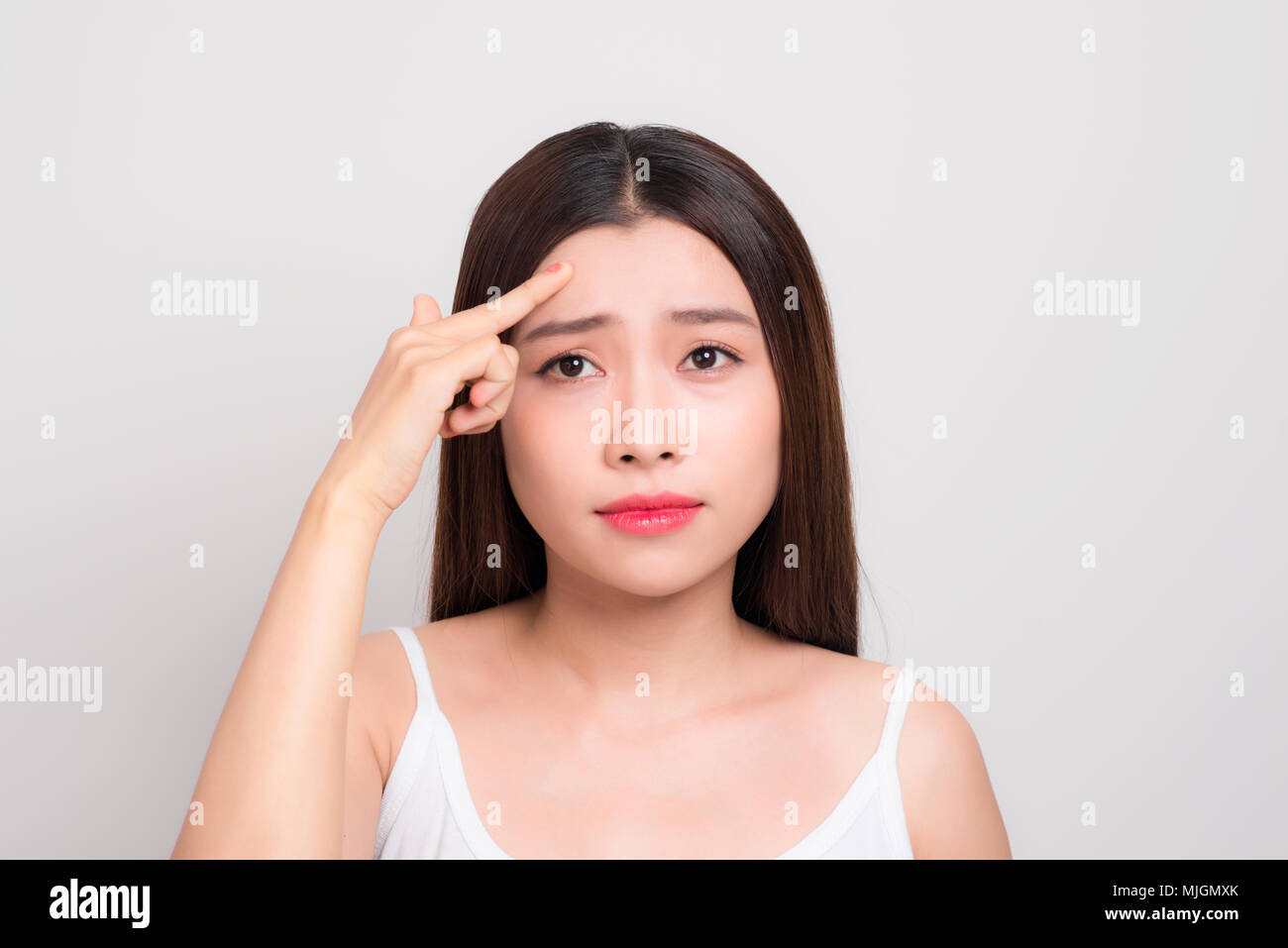 Sad asian woman with trouble of her skin Stock Photo - Alamy
