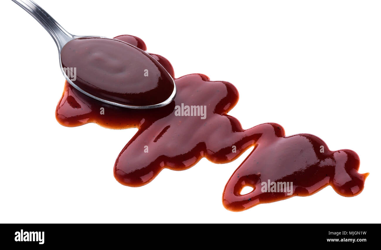 Barbecue sauce. Splashes and spilled grill sauce with spoon isolated on ...