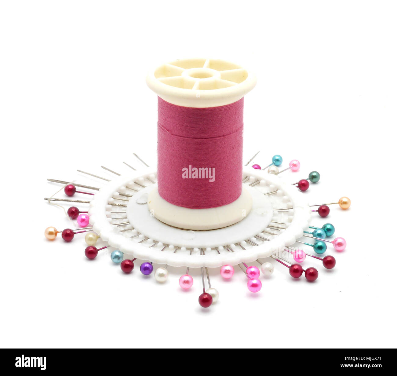 thread and needle isolated on white background Stock Photo - Alamy