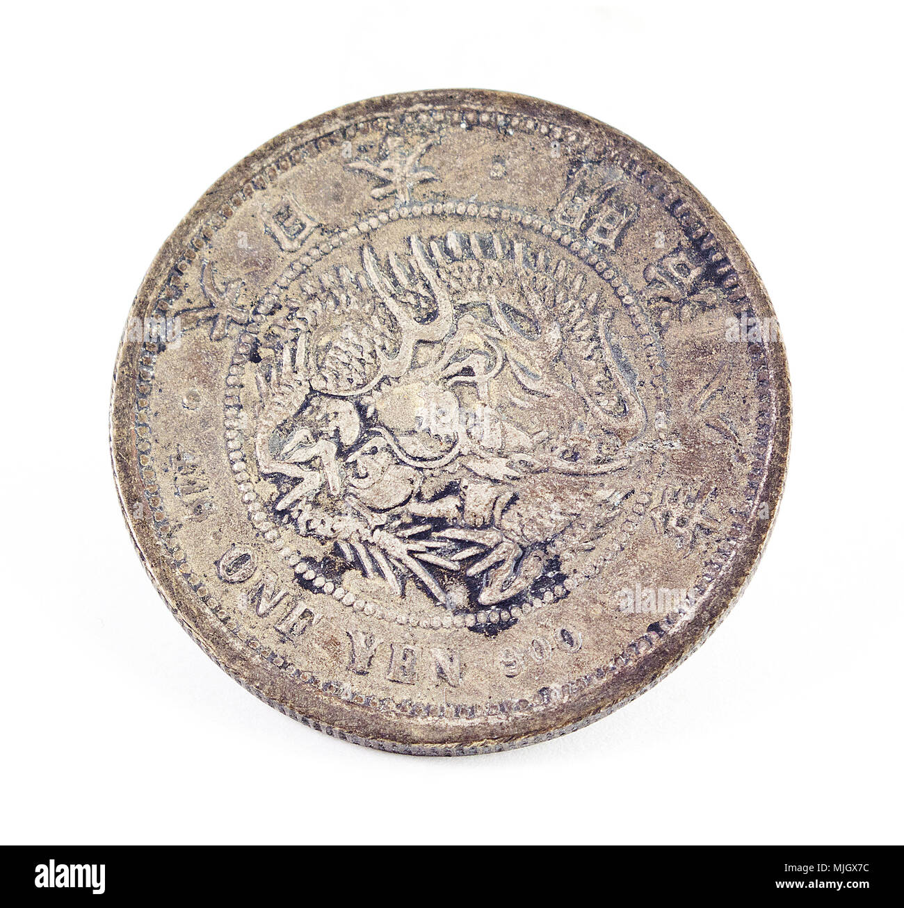 Old japan coin one yen dragon Stock Photo - Alamy