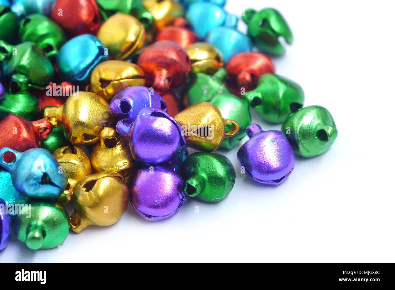 Colorful bell on white background Stock Photo - Alamy