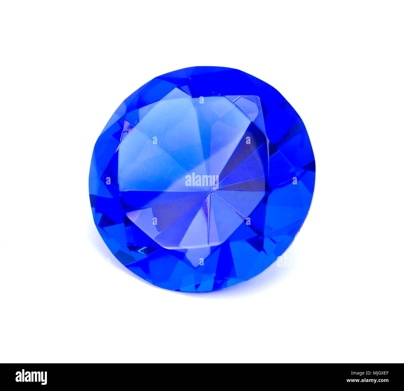 Blue sapphire gemstone isolated Stock Photo - Alamy