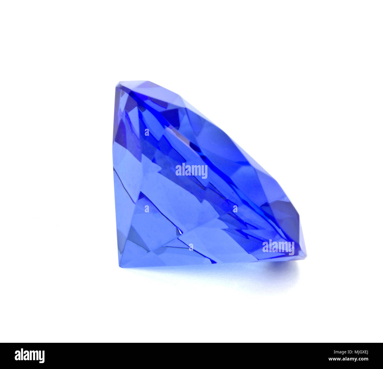 Blue sapphire gemstone isolated Stock Photo - Alamy