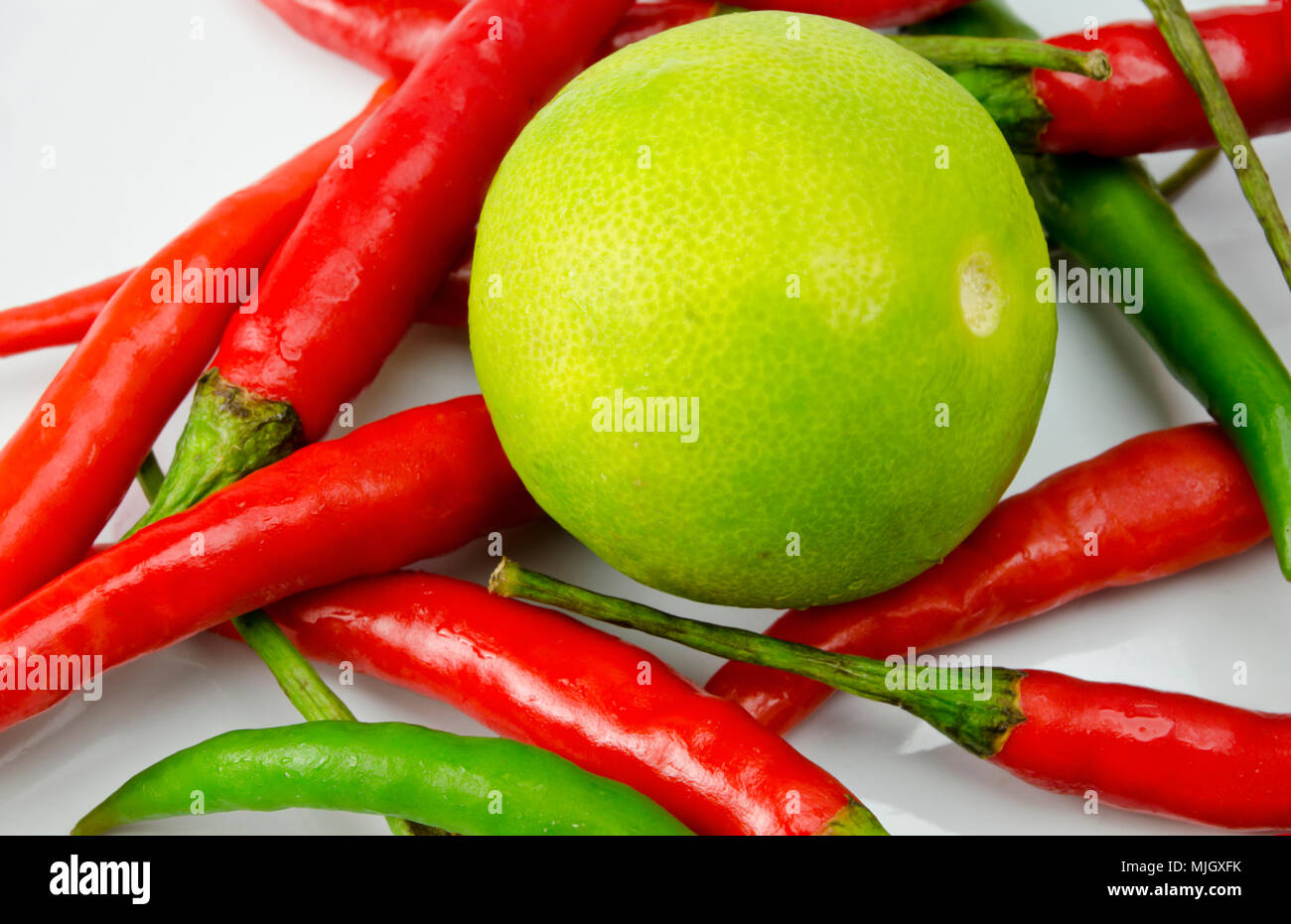 chili pepper & lemon Stock Photo - Alamy