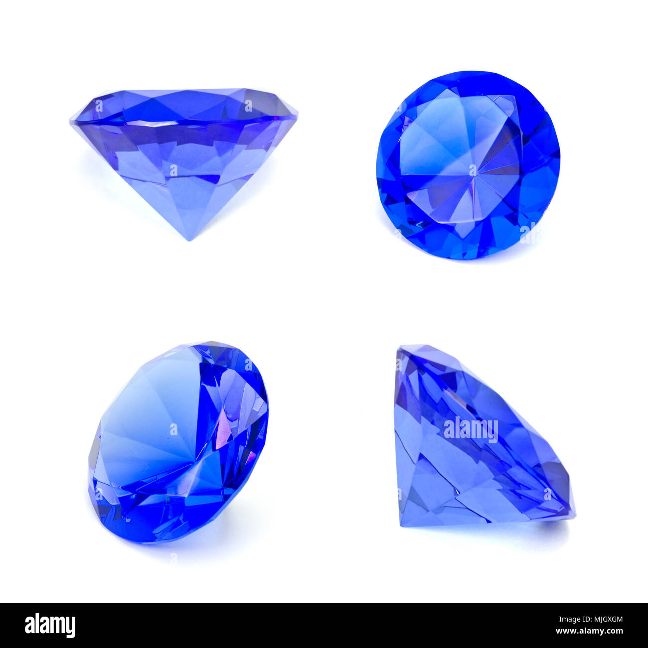 Blue sapphire gemstone isolated Stock Photo - Alamy