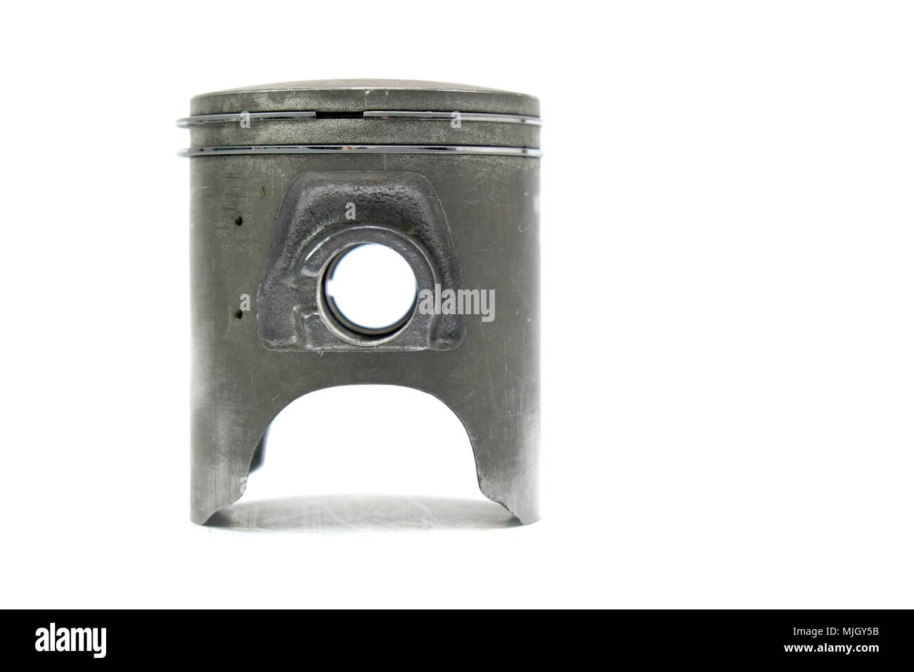 Old engine piston isolated on white background Stock Photo - Alamy