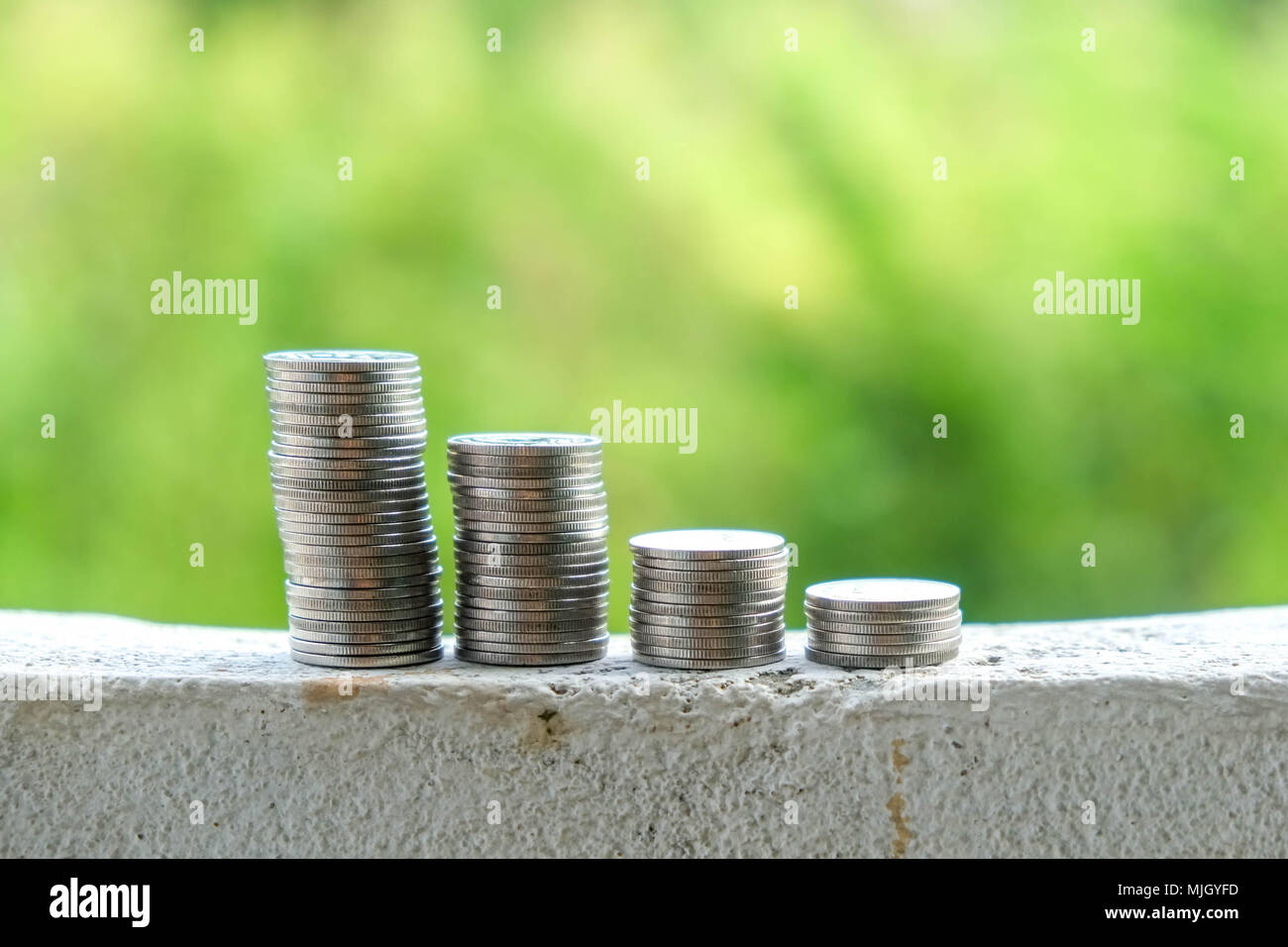 Coin stack money graph hi-res stock photography and images - Alamy