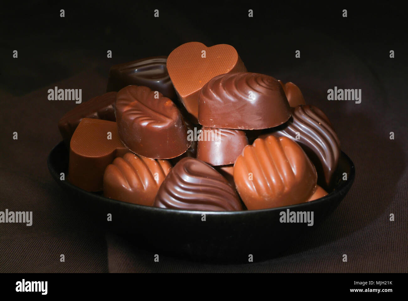 chocolate assorted with a background Stock Photo - Alamy