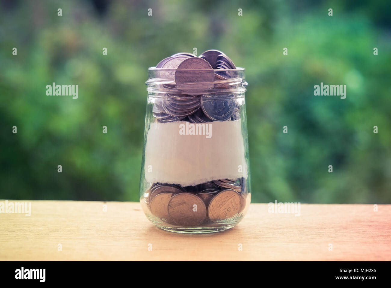 Money in glass filter hi-res stock photography and images - Alamy