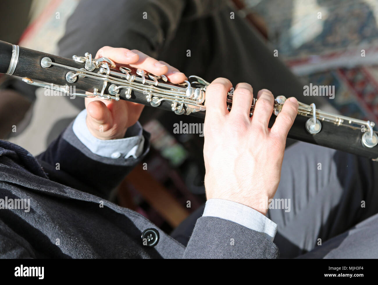 two hands of a skill elegant flute player during a live concert Stock ...
