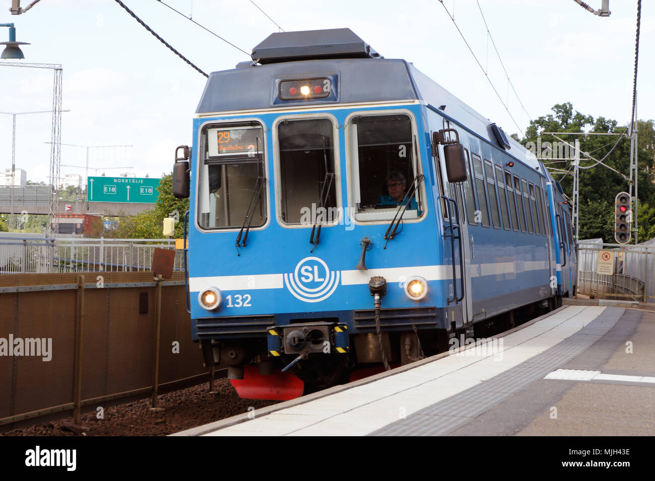 Stocksund, Sweden - July 28, 2016: A blue commuter train on the SL ...