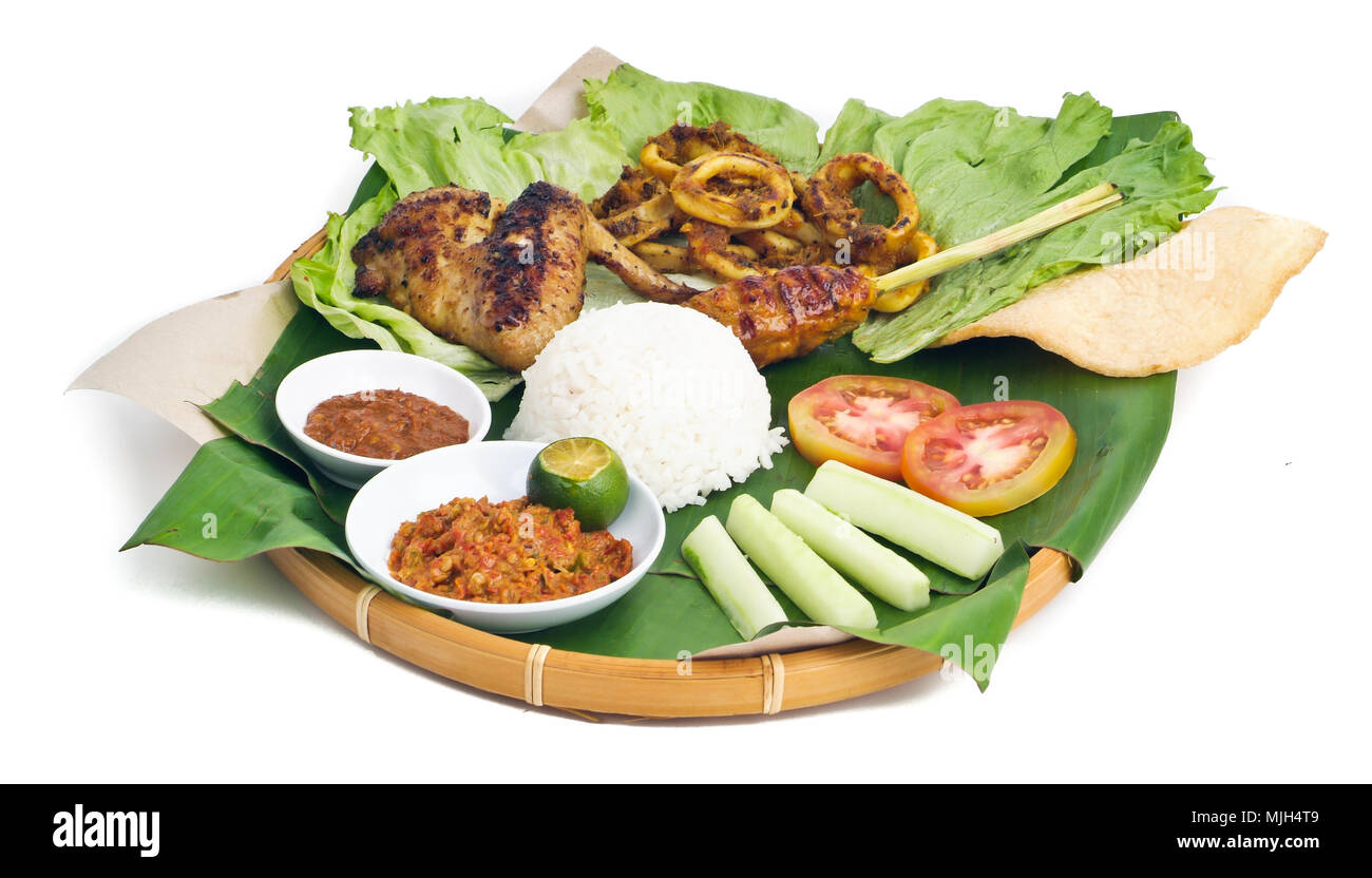 Indonesian traditional food, chicken, fish, vegetables Stock Photo - Alamy