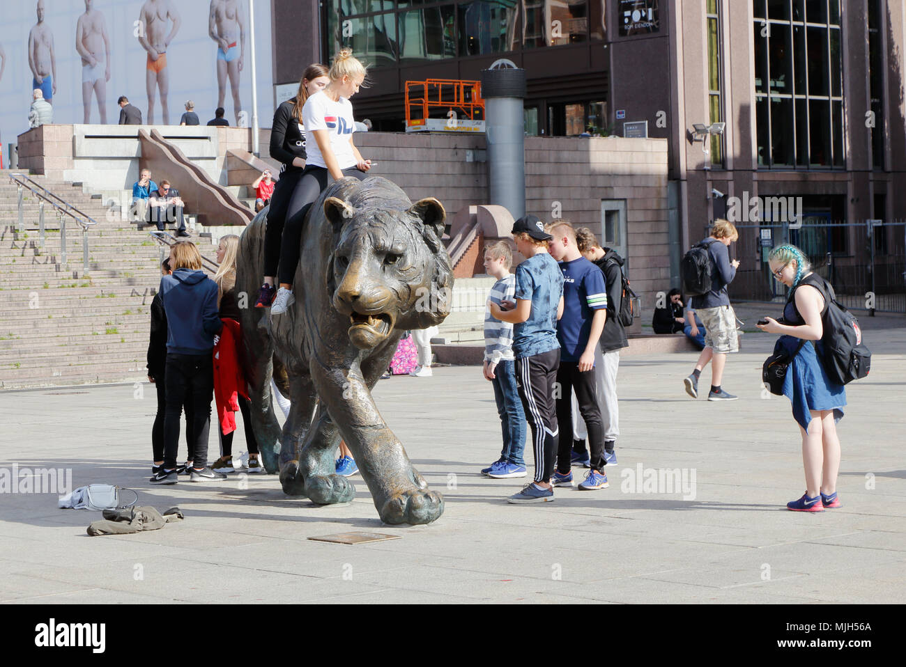 Riding the tiger hi-res stock photography and images - Alamy