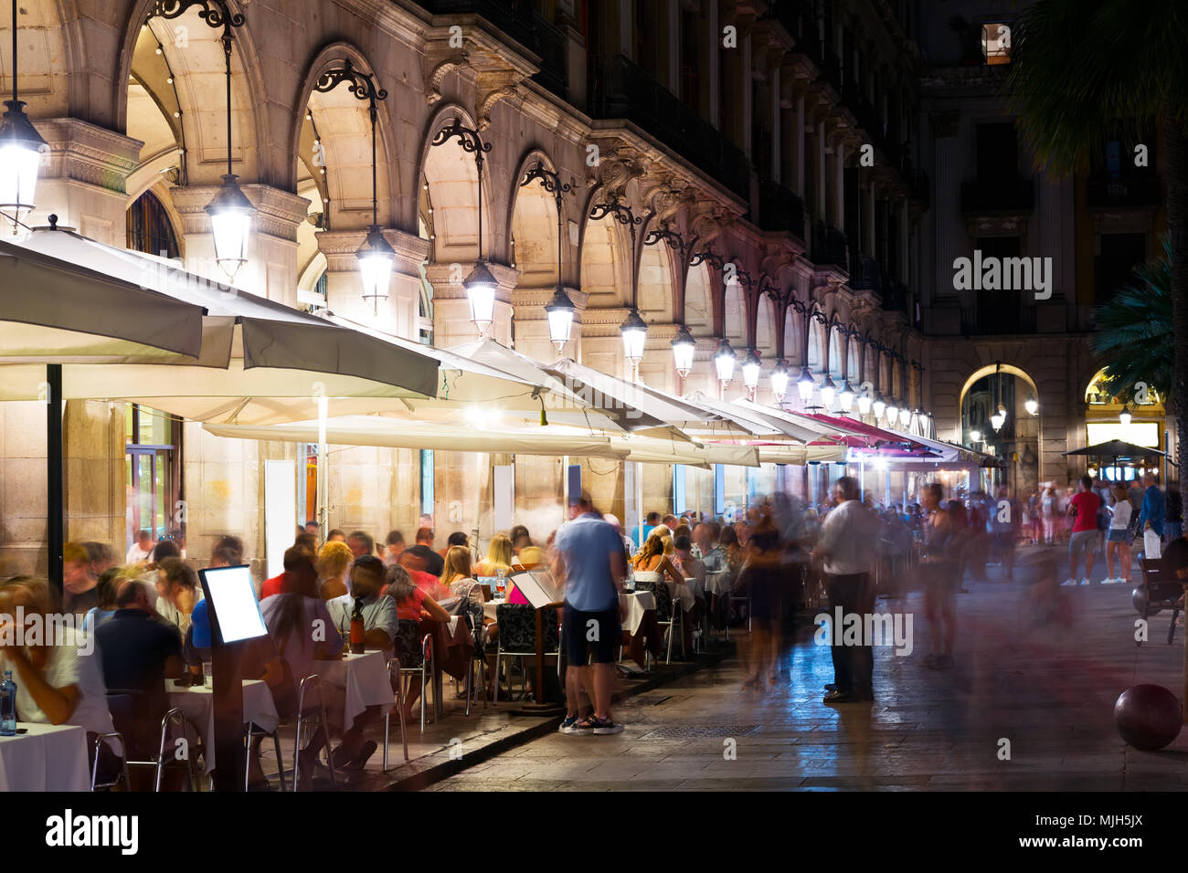 Famous Placa Reial (Royal Square) illuminated at night in Barcelona ...