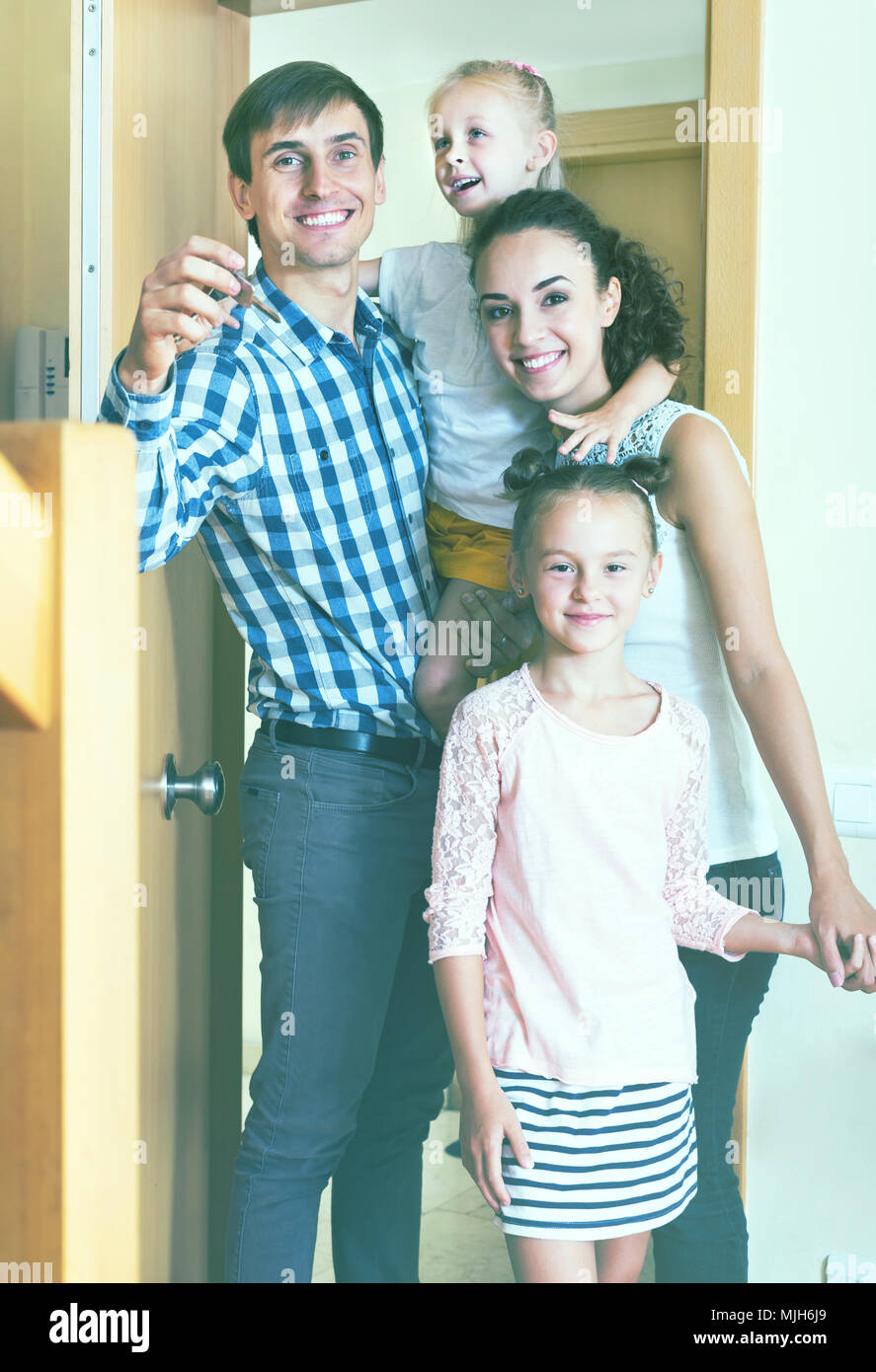 Ordinary middle class family moving in they new house Stock Photo - Alamy