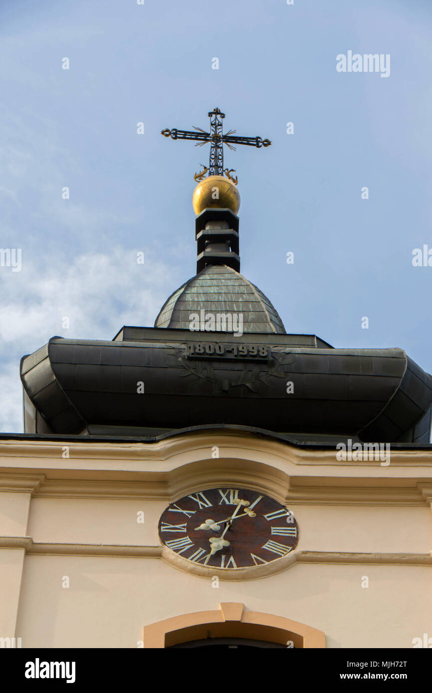 Old clock at the top of the Catholic Church Stock Photo - Alamy