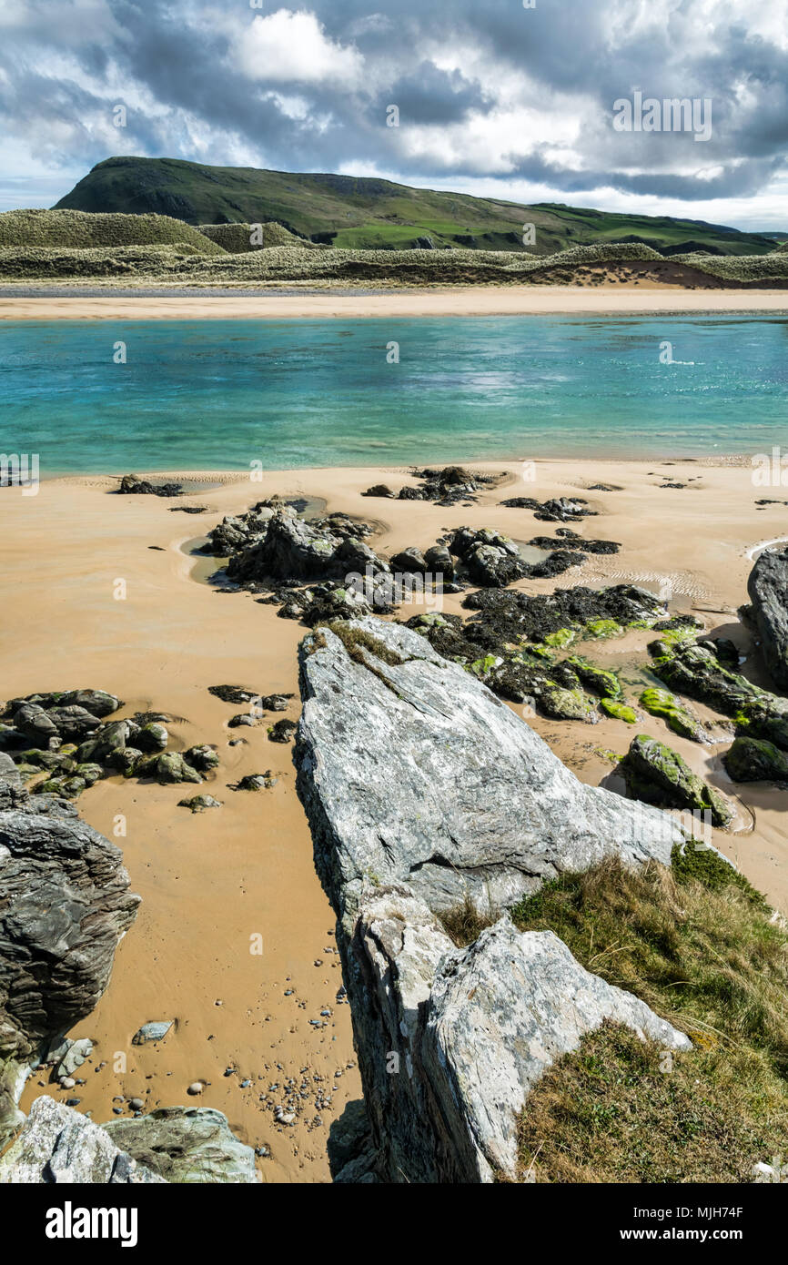 This is from a beach in Ireland at low tide. the for ground has a beach ...