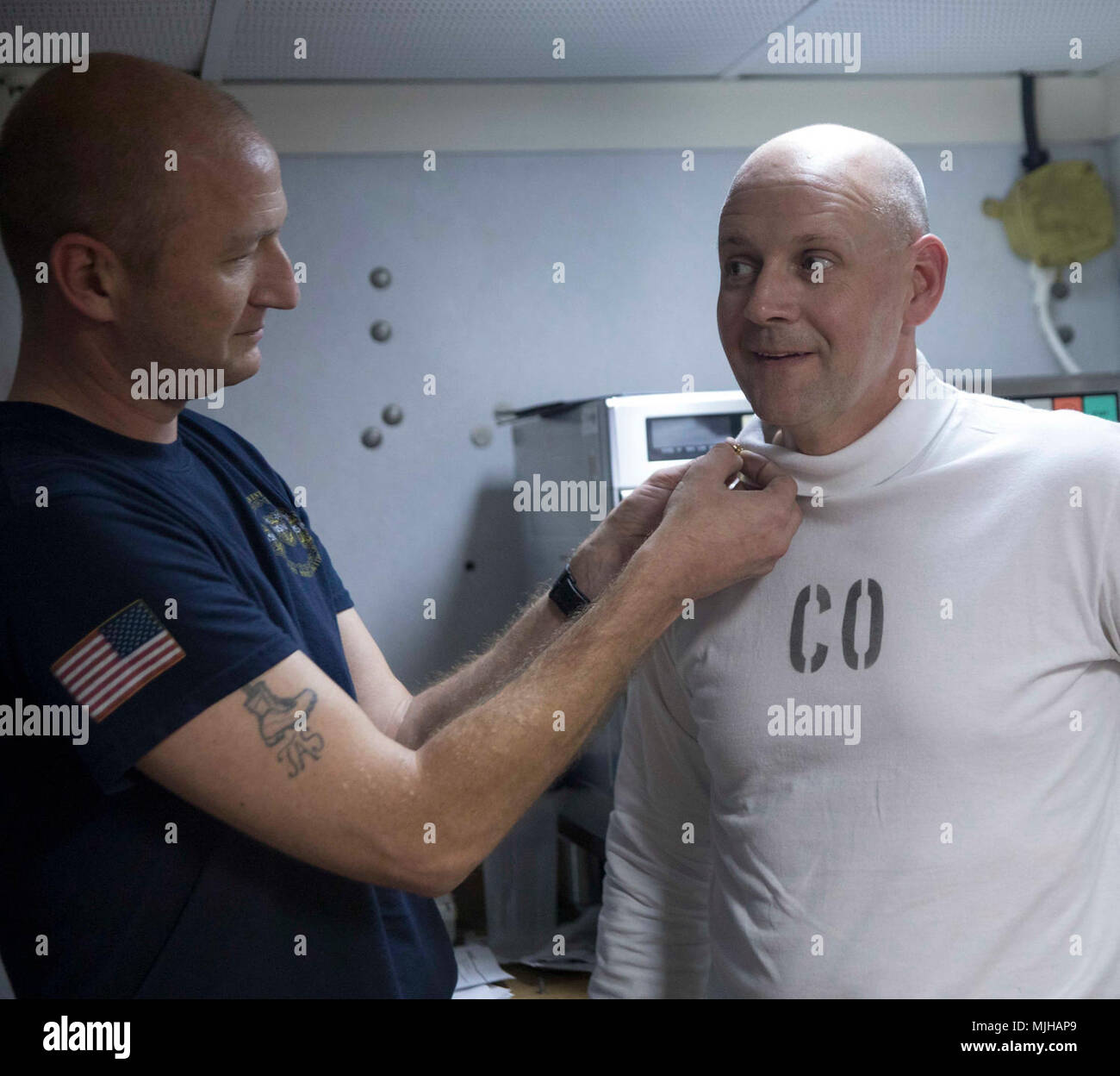 MEDITERRANEAN SEA (April 1, 2018) Command Master Chief Ben Hodges (left ...