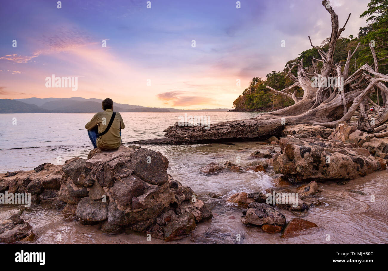 Male tourist enjoy beach sunset with scenic landscape view at Chidiya ...