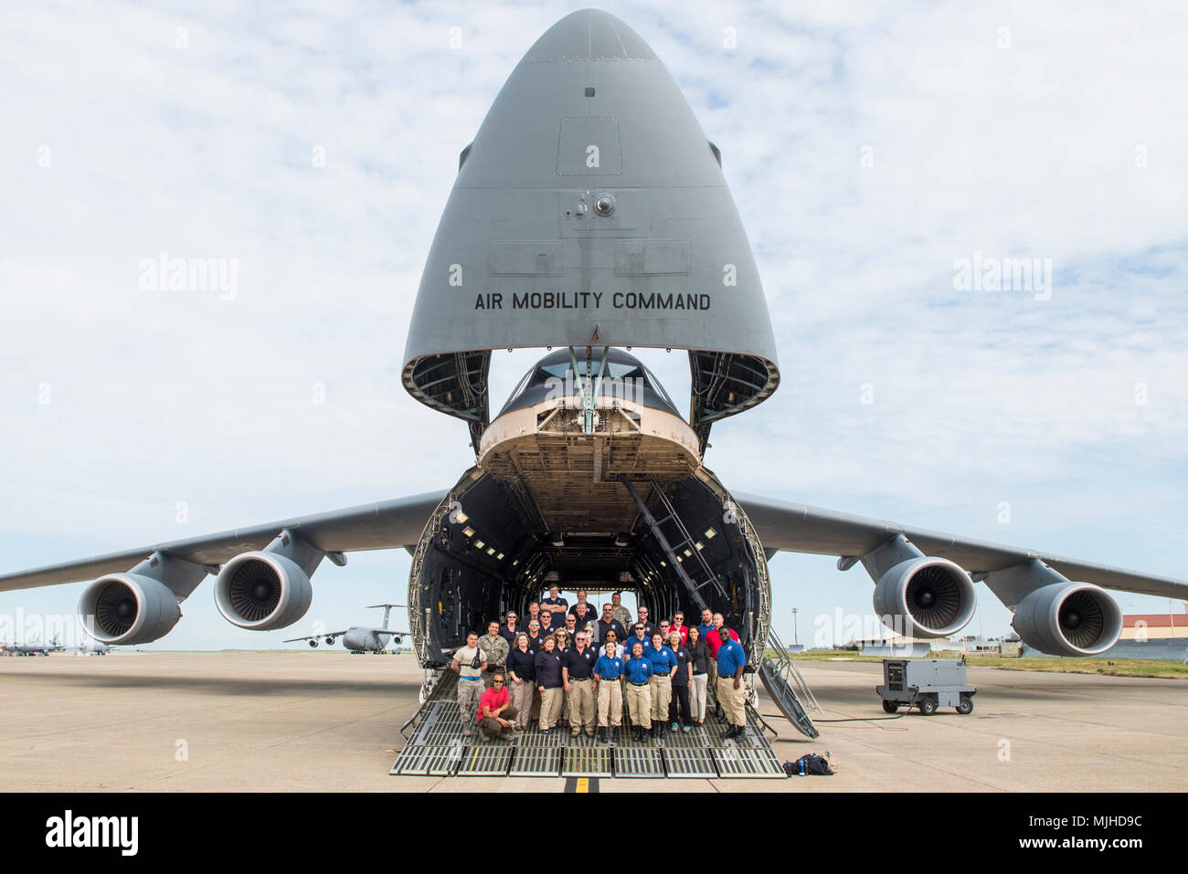 Airmen from the 60th Aerial Port Squadron along with members of the ...