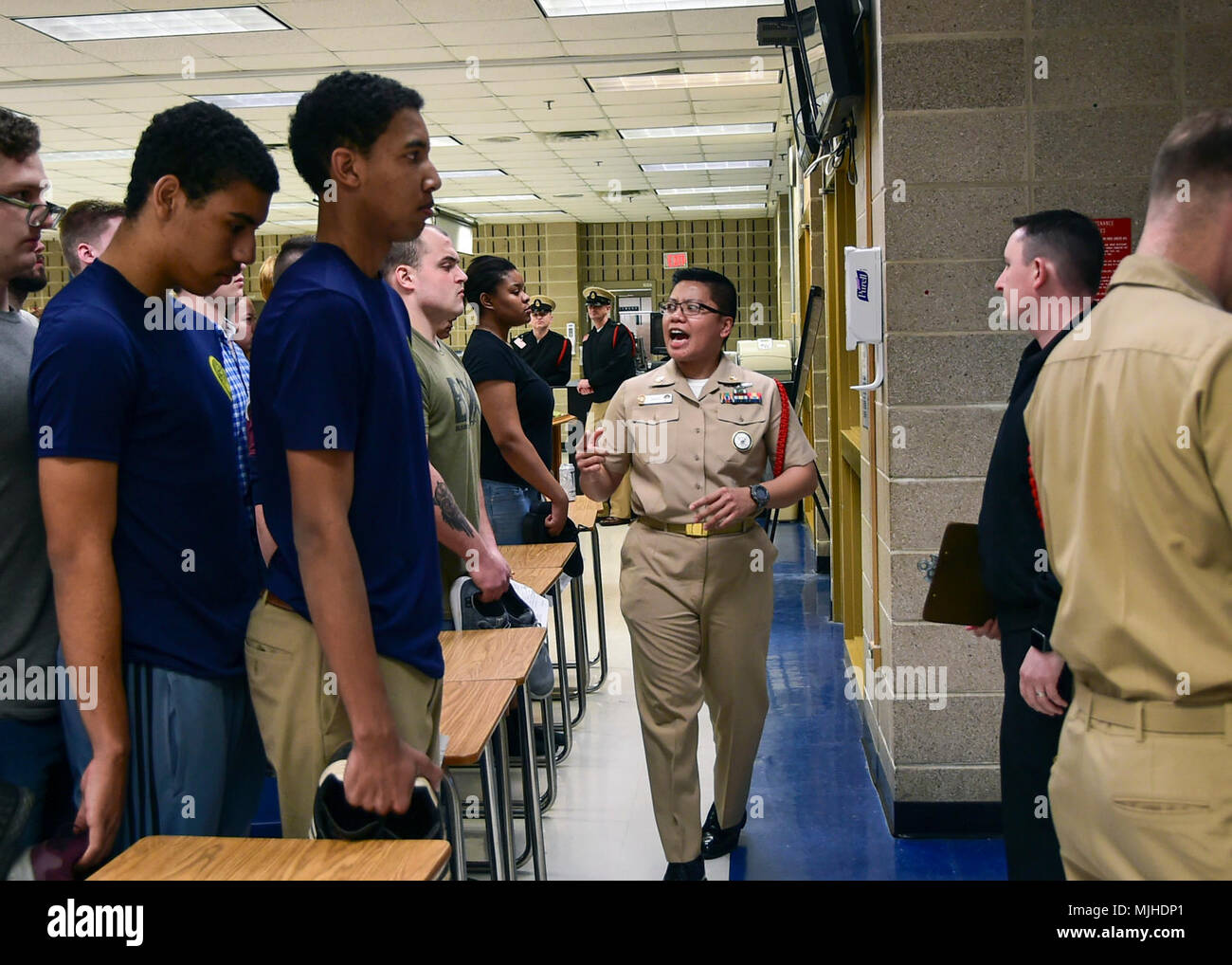 LAKES, Ill. (April 3, 2018) Chief Hospital Corpsman Jaden Sandi, center ...