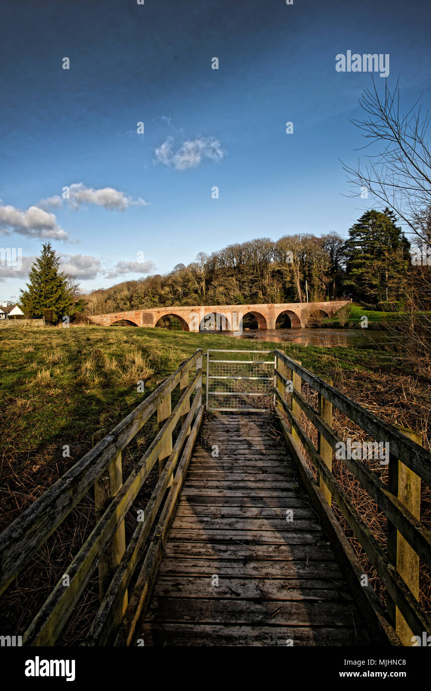The Wye, at Brobury, is crossed by a long, narrow brick bridge built in ...