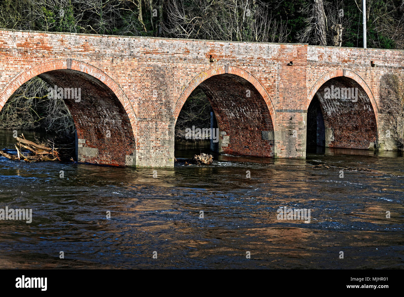 The Wye, at Brobury, is crossed by a long, narrow brick bridge built in ...